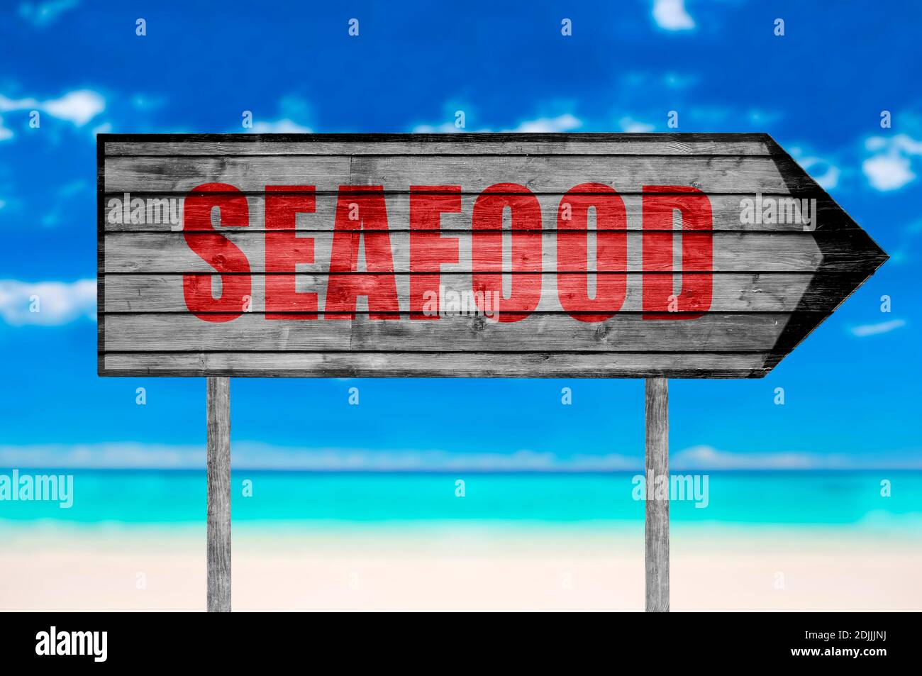 Red Seafood wooden sign with a beach on background Stock Photo - Alamy