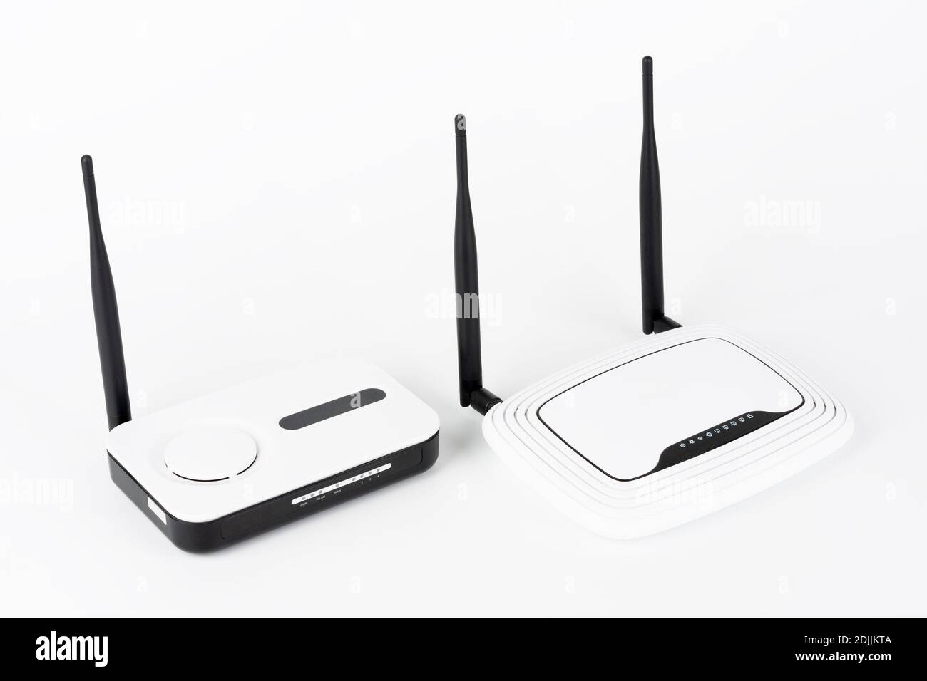 Two wifi routers, wireless devices with one and two antennas on white ...