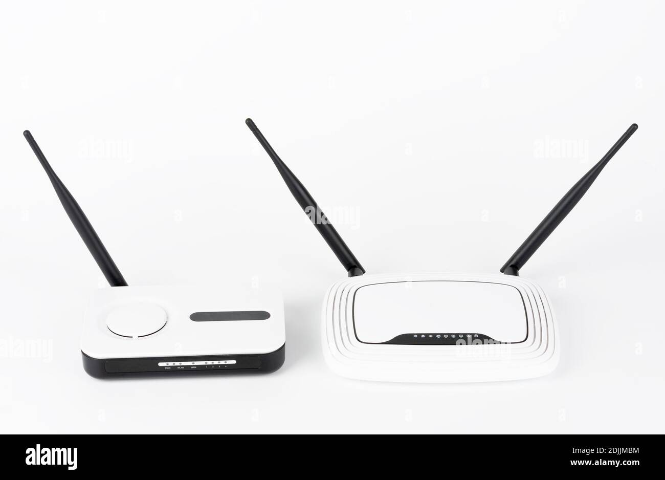 Two wifi routers, wireless devices with one and two antennas on white ...