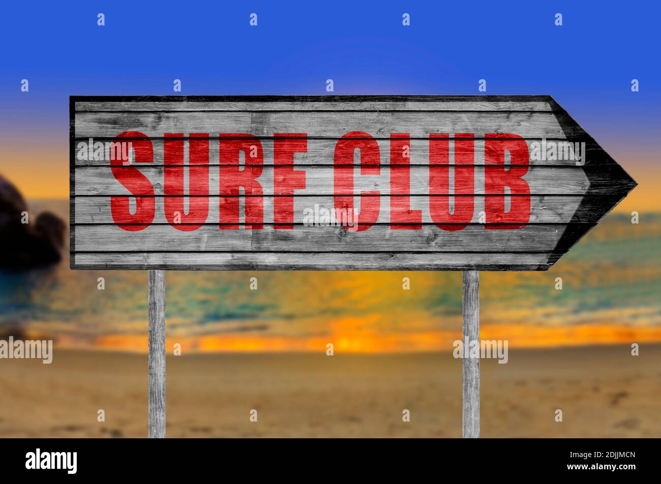 Red Surf Club wooden sign with on a beach background Stock Photo - Alamy