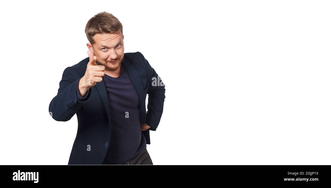 Man point to viewer while standing against white background Stock Photo ...