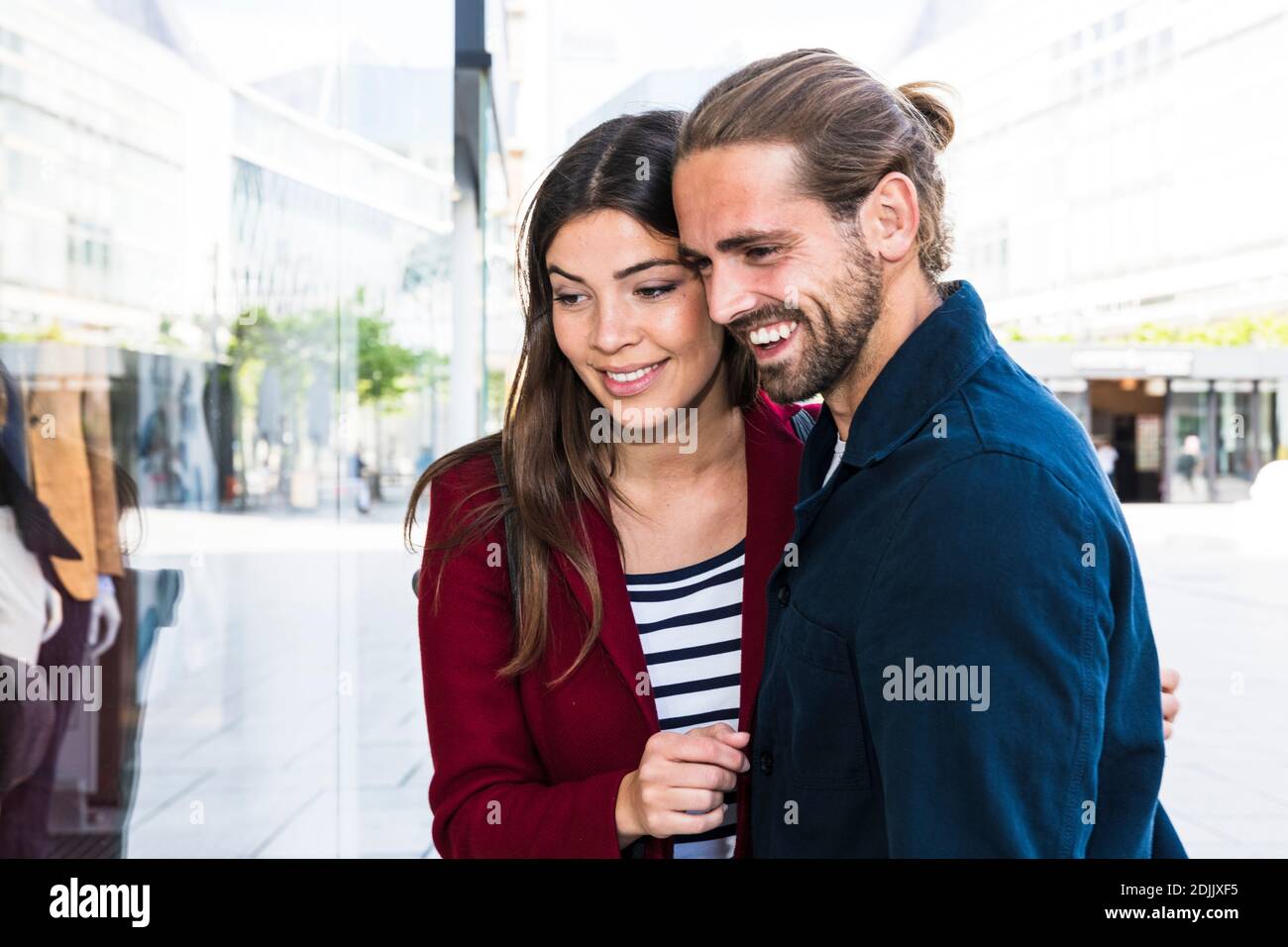 young couple out and about in the city Stock Photo - Alamy