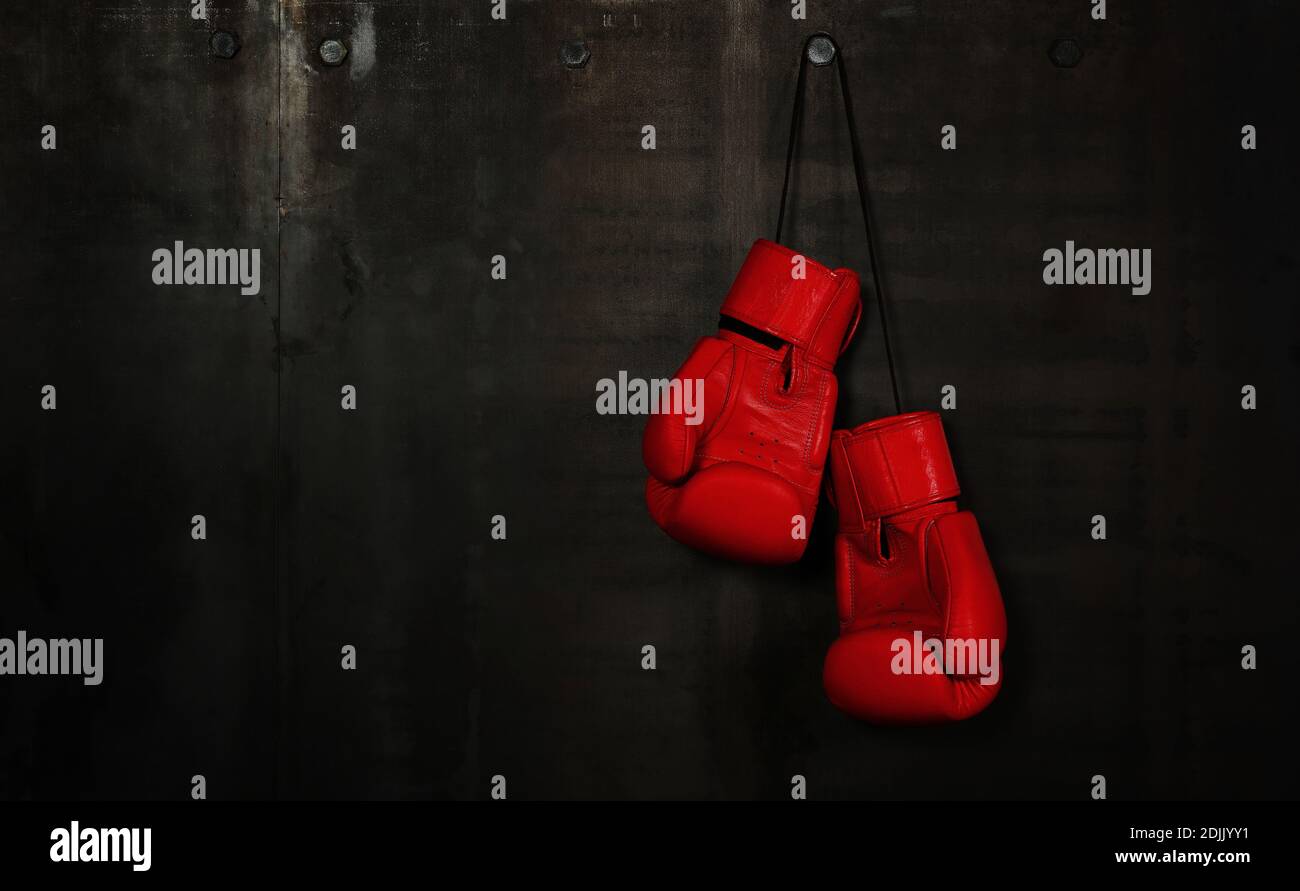 Hanging up boxing gloves hi-res stock photography and images - Alamy
