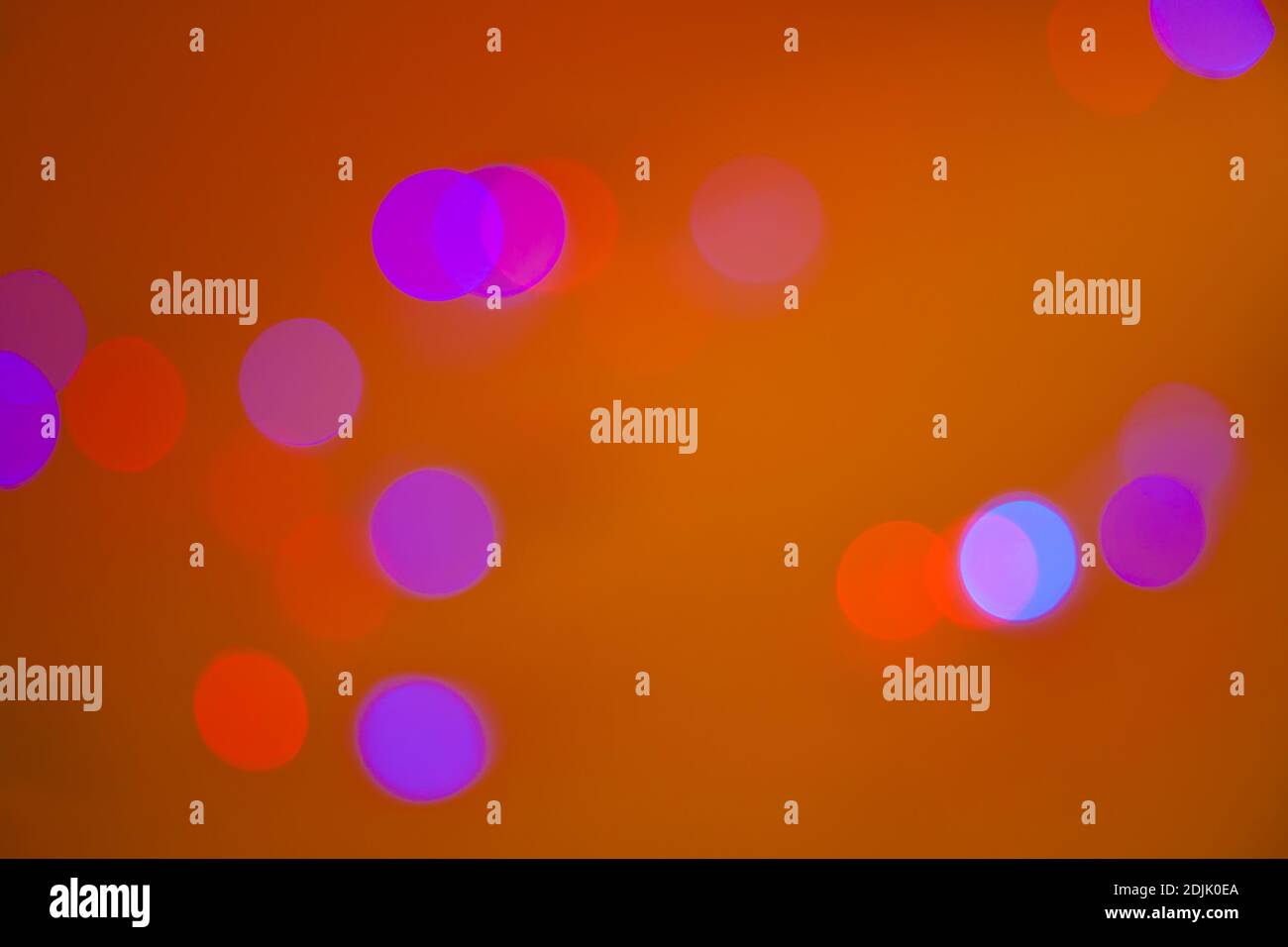 multi-colored lights on a dark background to blur Stock Photo - Alamy