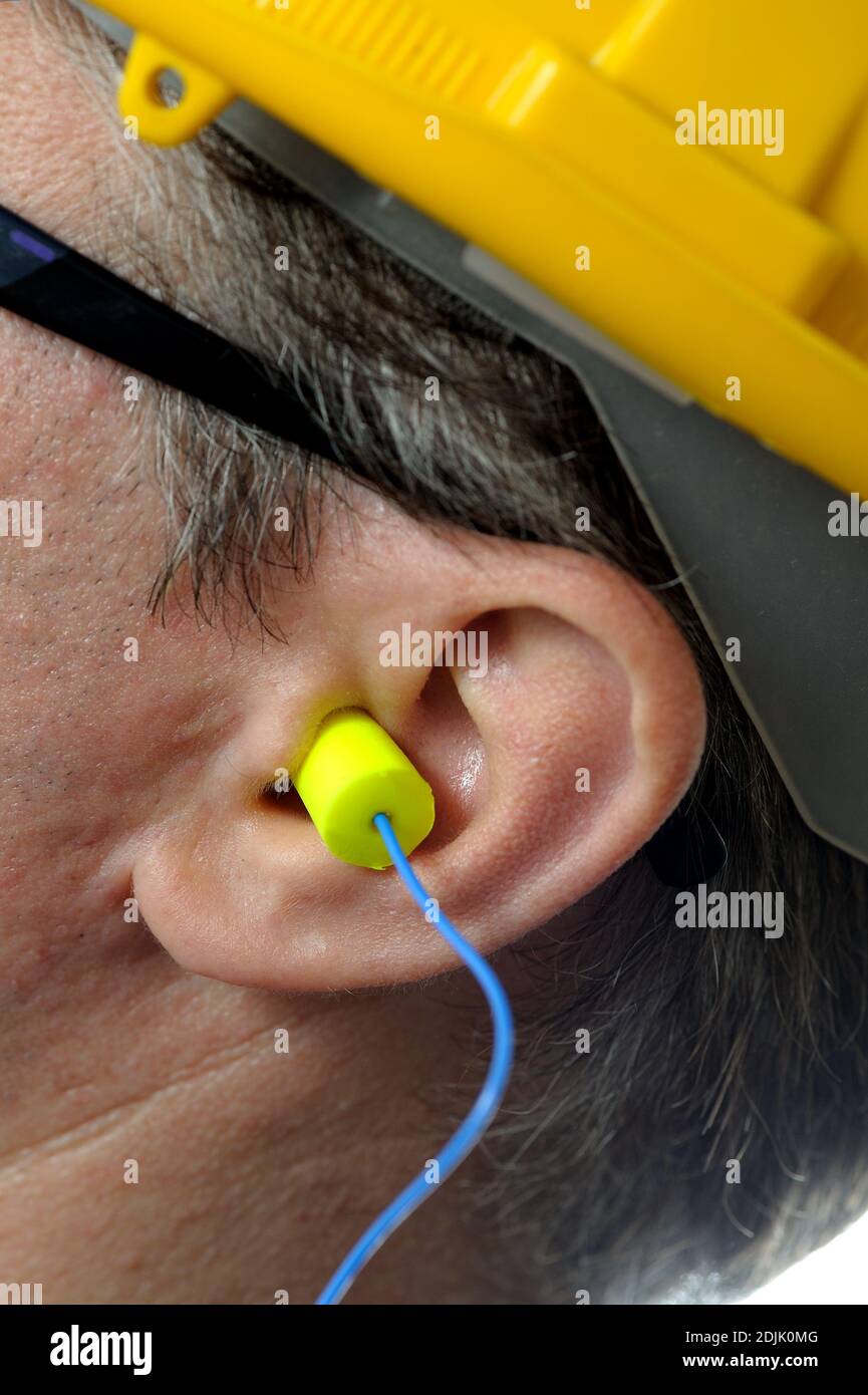 Man wearing ear eye protection hi-res stock photography and images - Alamy