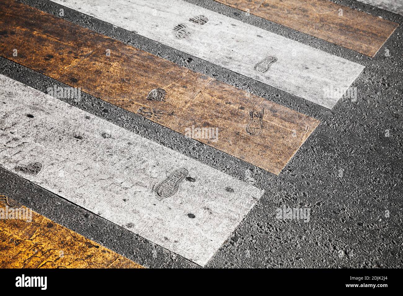 Pedestrian crossing. Yellow white road marking zebra with imprinted ...