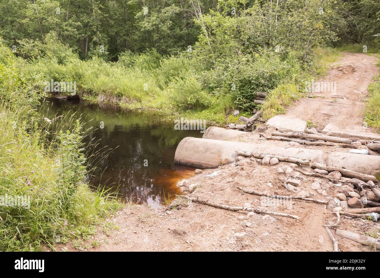 Empty damaged rural road with old bridge, off-road transportation ...