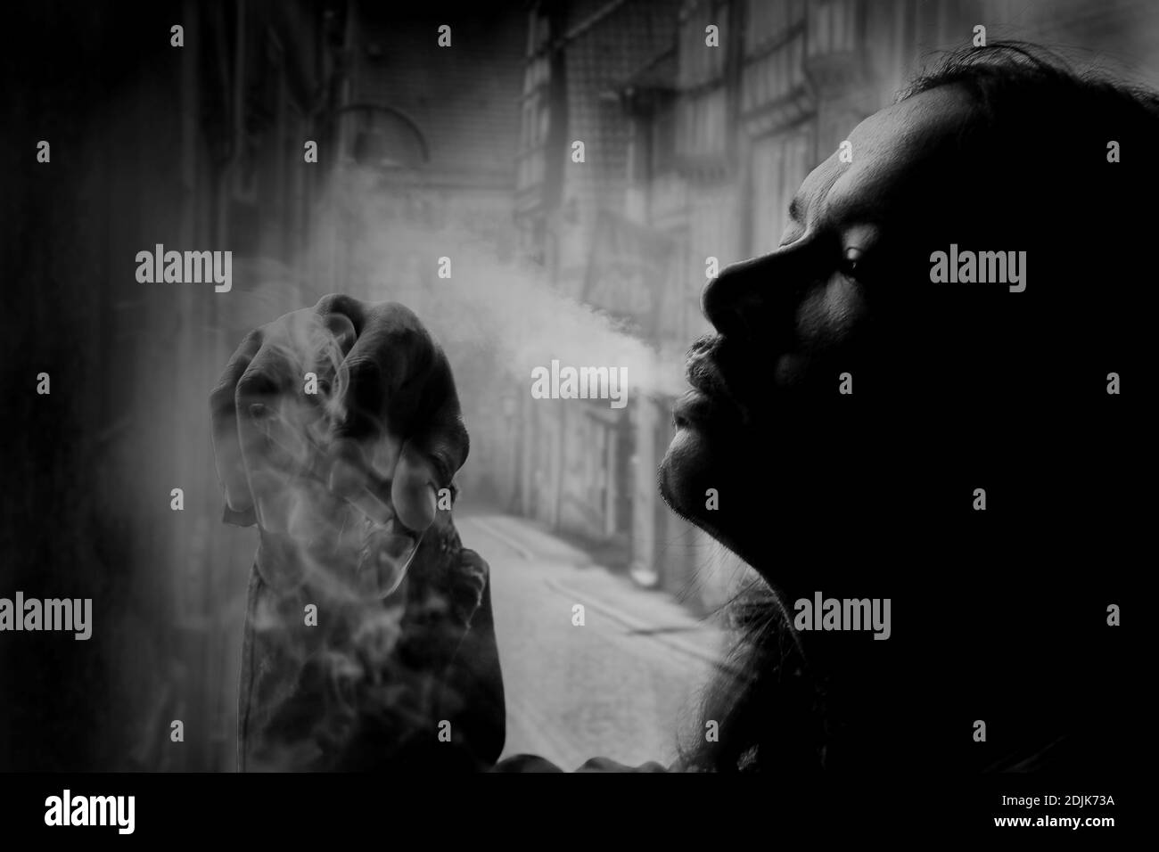 Smoking man at the window Black and White Stock Photos & Images - Alamy