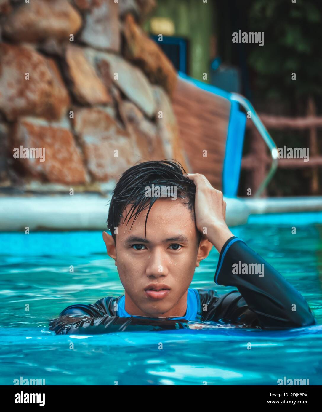 Indian man in swimming pool hi-res stock photography and images - Alamy