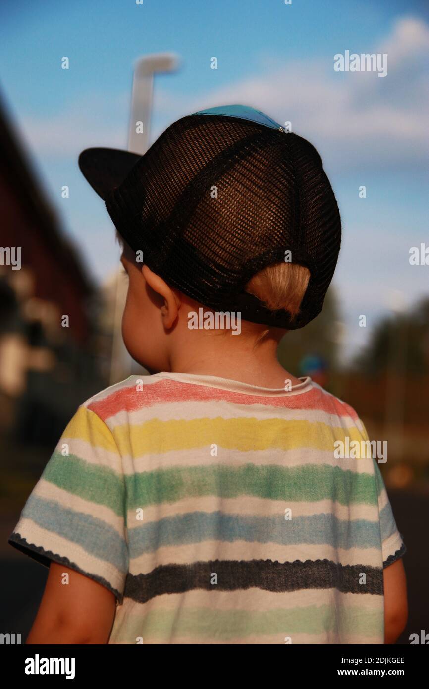Boy wearing cap rear view hi-res stock photography and images - Alamy