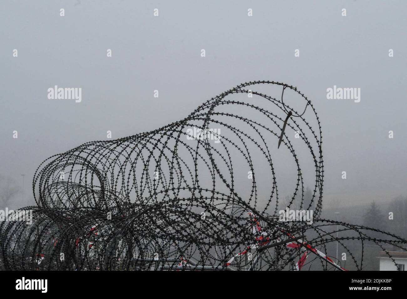 barbed wire as barrier in a prison, measure to prevent outbreaks Stock ...