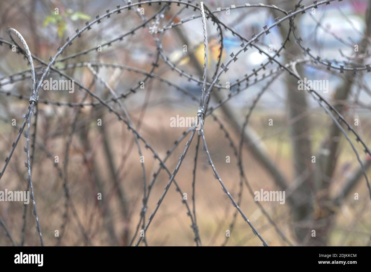 barbed wire as barrier in a prison, measure to prevent outbreaks Stock ...
