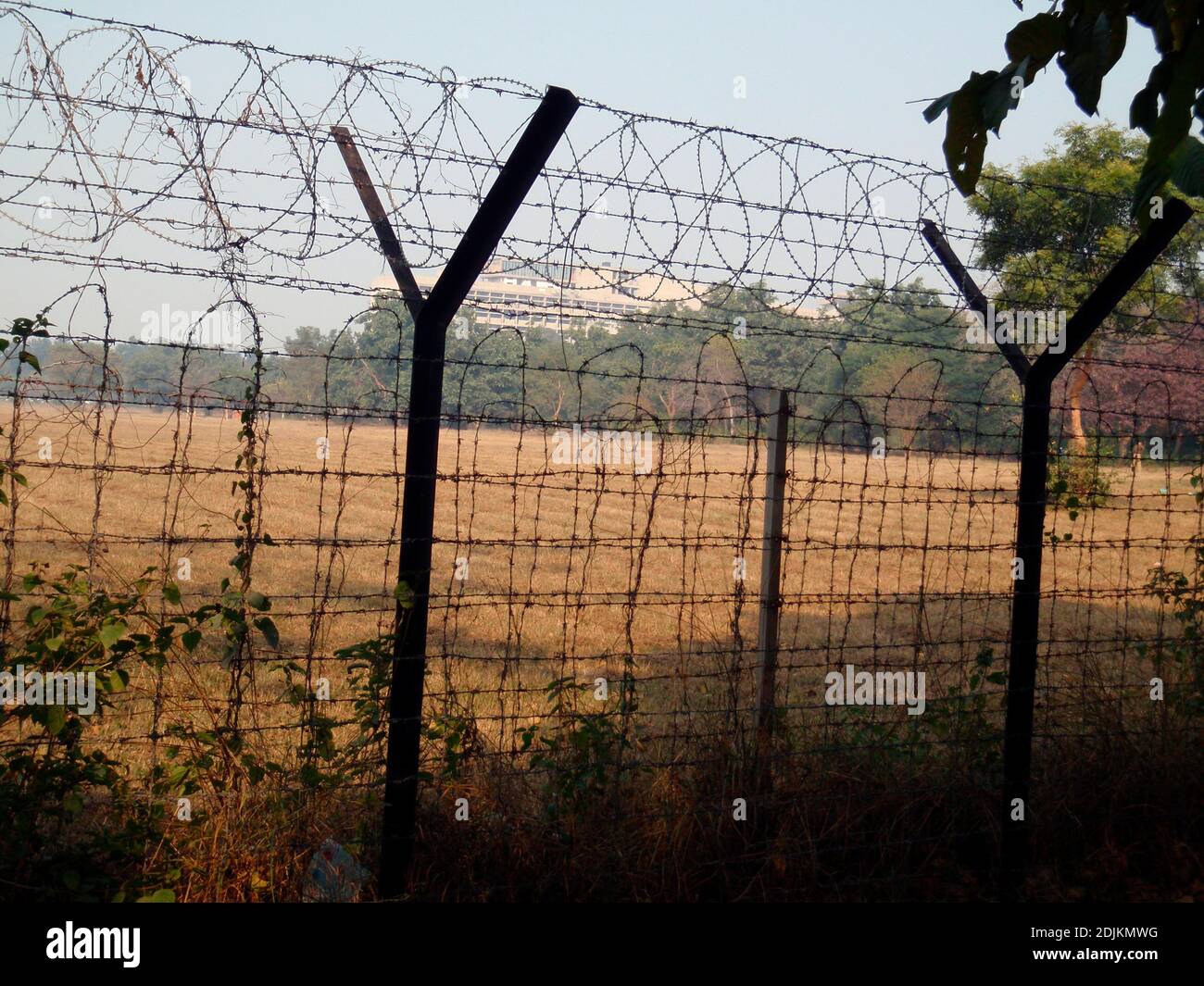 barbed wire as barrier in a prison, measure to prevent outbreaks Stock ...