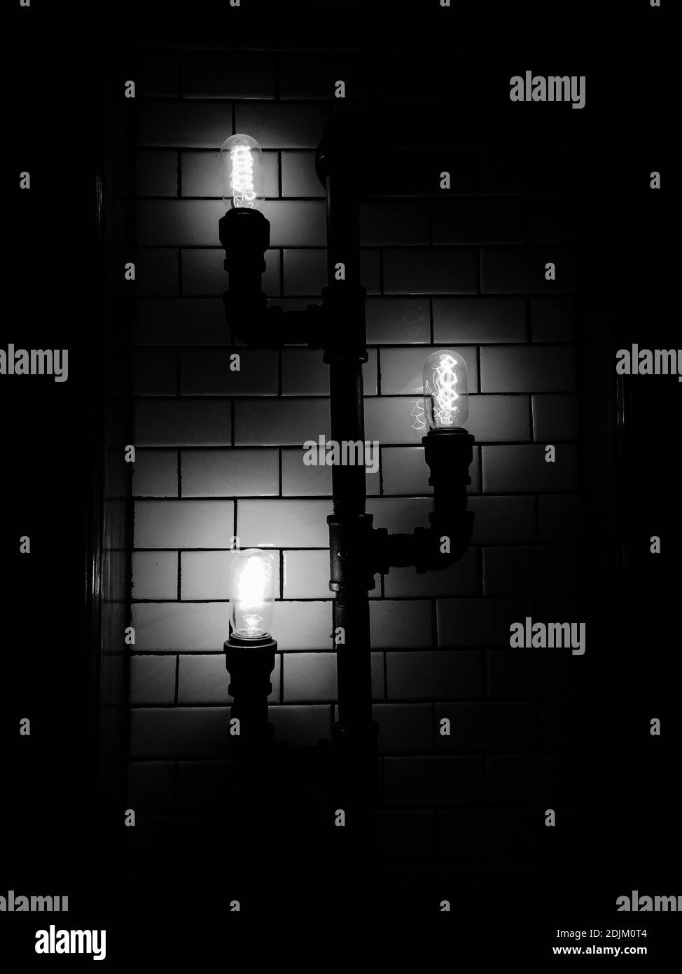 People In Illuminated Light Bulb Stock Photo - Alamy