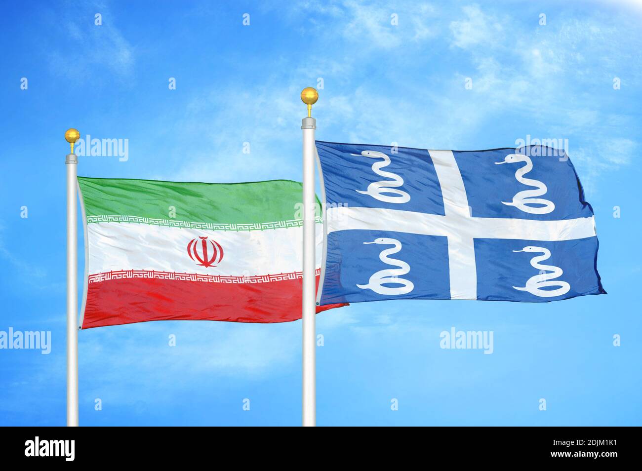 Iran and Martinique snake two flags on flagpoles and blue cloudy sky ...