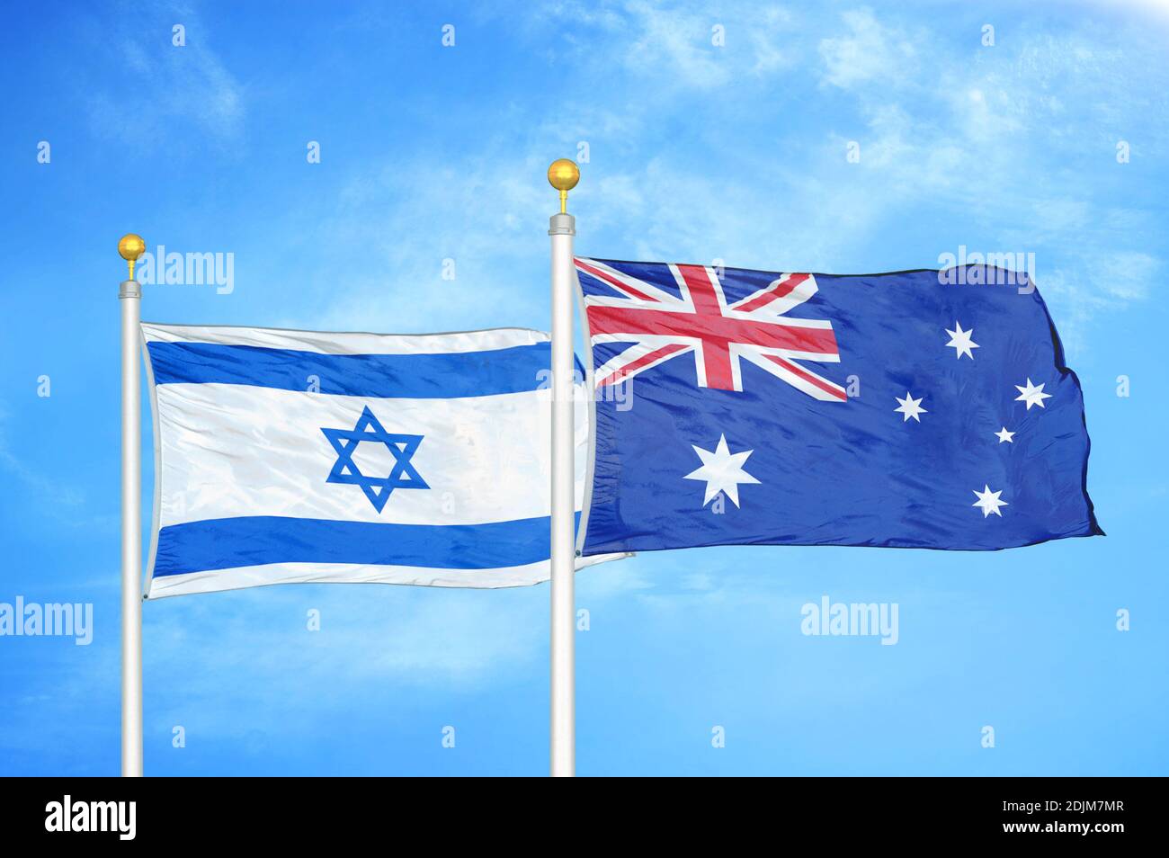 Israel and Australia two flags on flagpoles and blue cloudy sky Stock ...