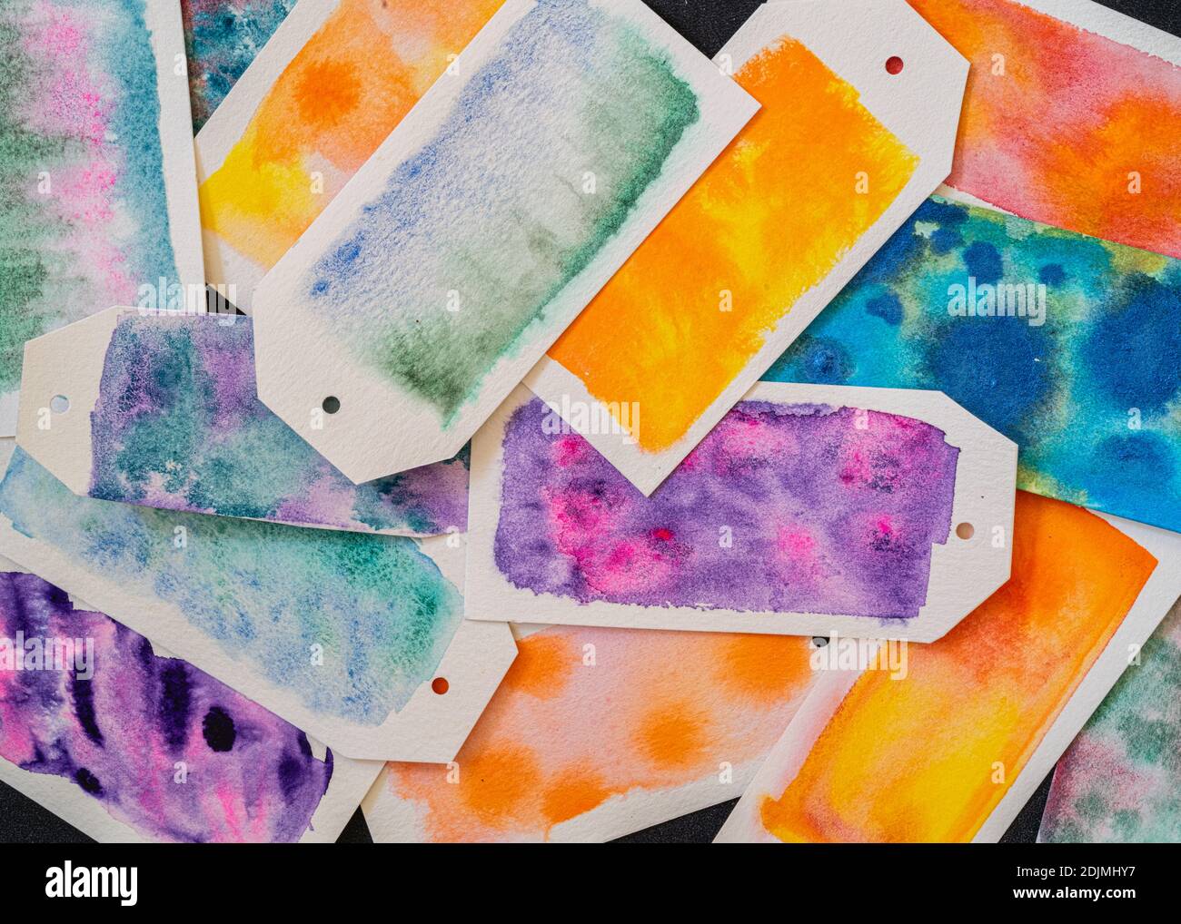 Homemade gift tags made out of watercolor paper and painted with ...