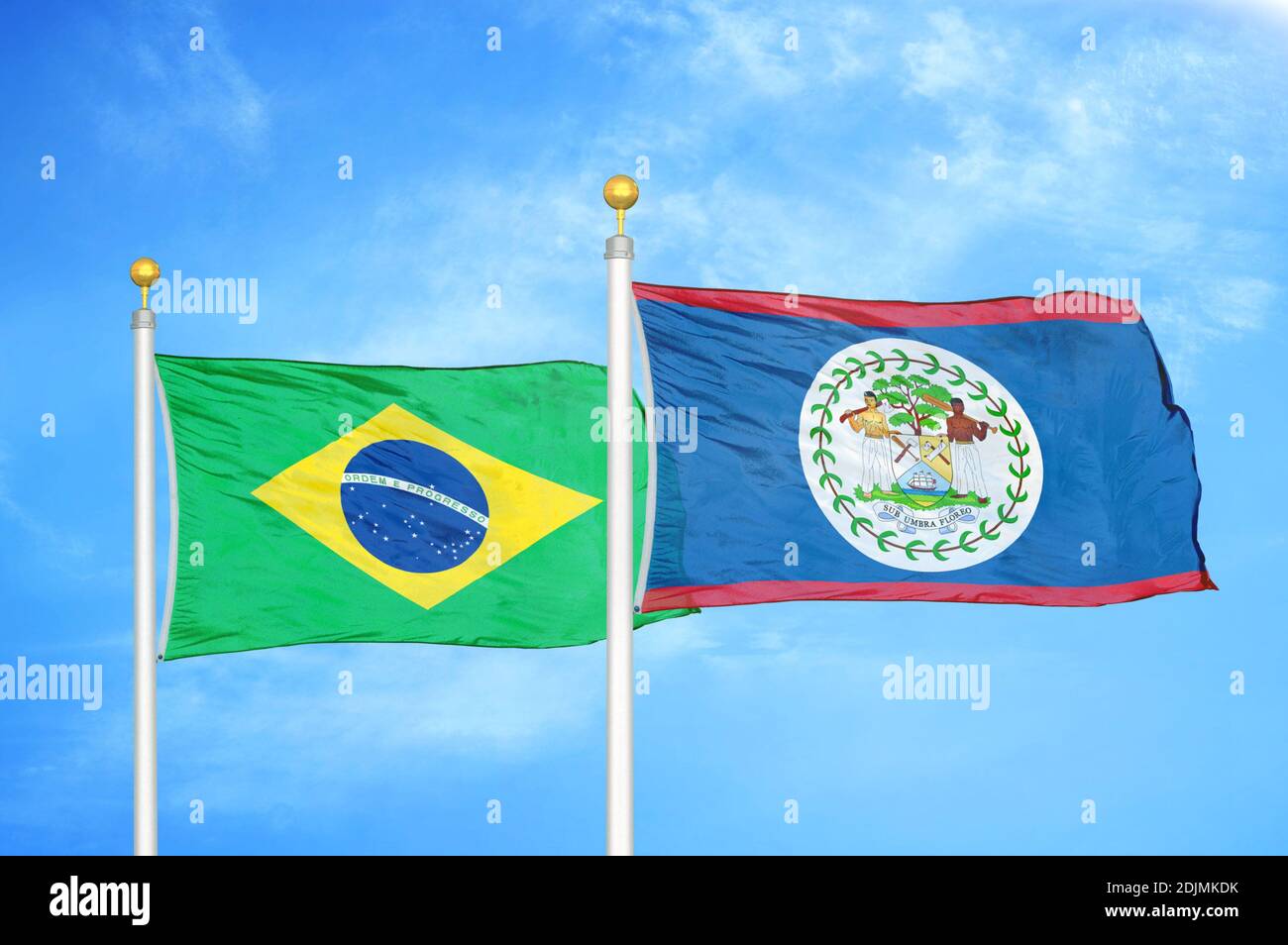 Brazil and Belize two flags on flagpoles and blue cloudy sky Stock ...
