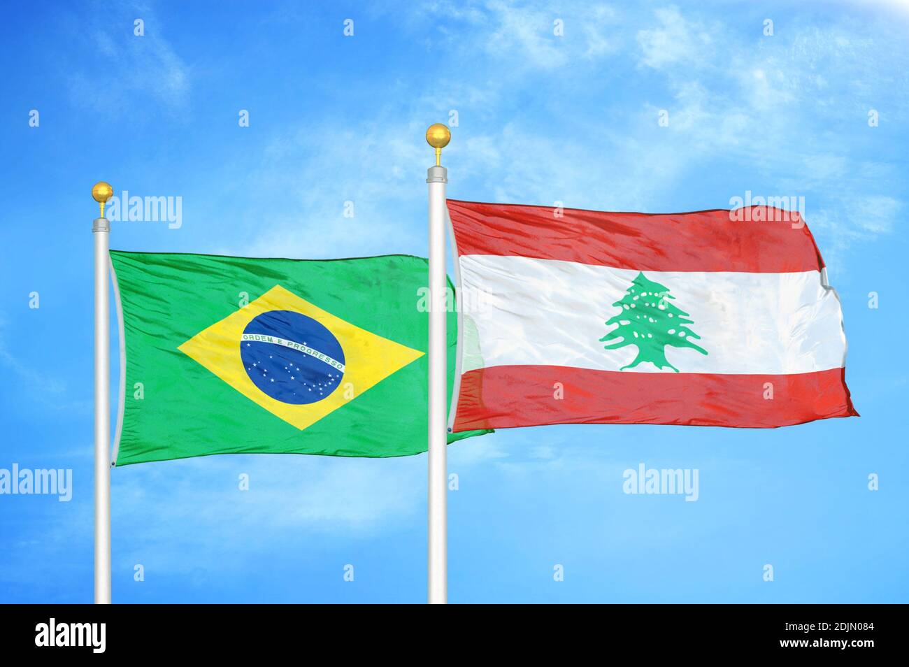 Brazil and Lebanon two flags on flagpoles and blue cloudy sky Stock ...
