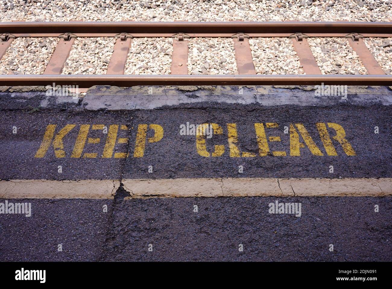 Keep clear signage beside old railway tracks Stock Photo - Alamy