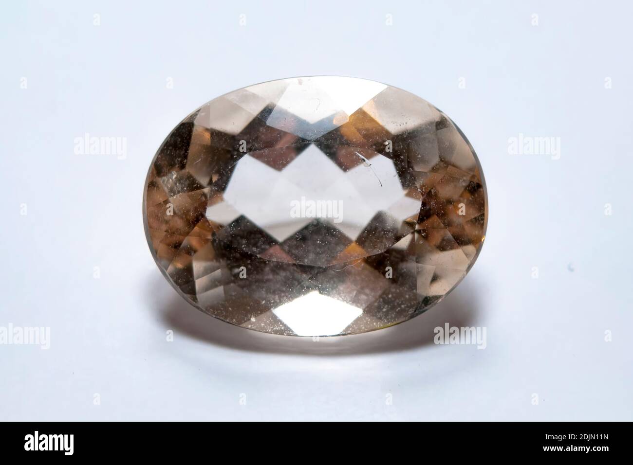 Natural heliodor on a gray background. Natural beryl Stock Photo - Alamy