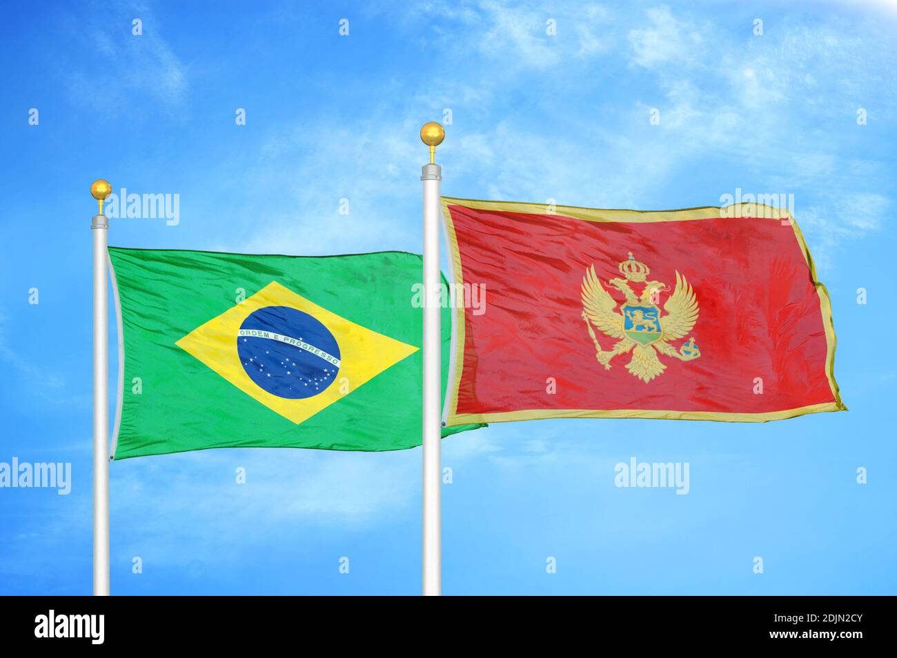 Brazil and Montenegro two flags on flagpoles and blue cloudy sky Stock ...