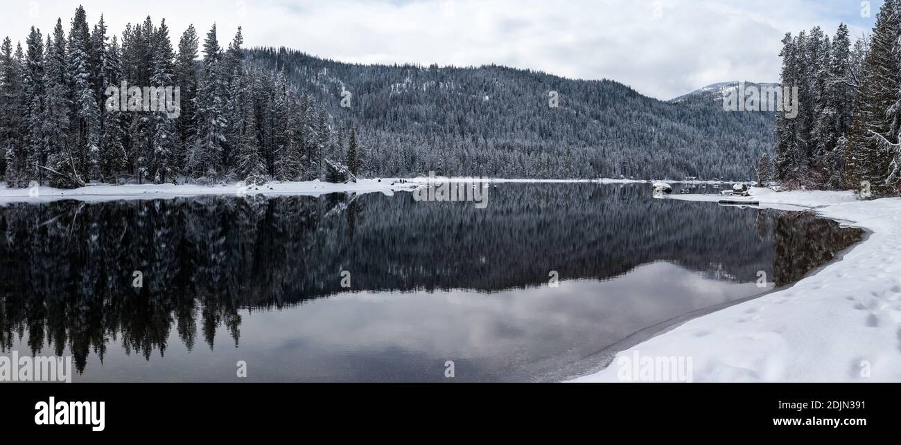 Panorama of Wintry Forest in Mountain Lake Stock Photo - Alamy