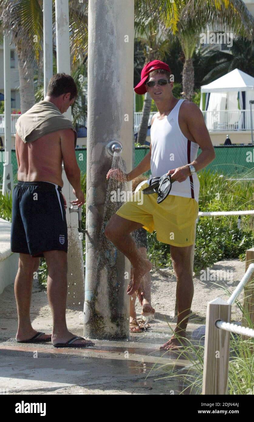 UK's Steven Gerrard and pals play a game of sand trap soccer ball with ...