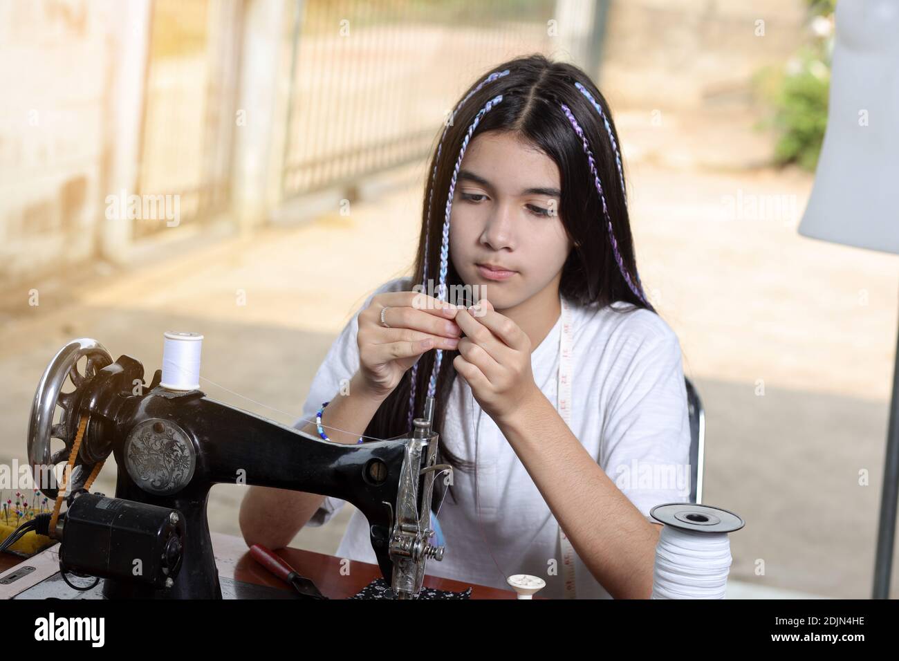 Girls in sewing factory hi-res stock photography and images - Alamy