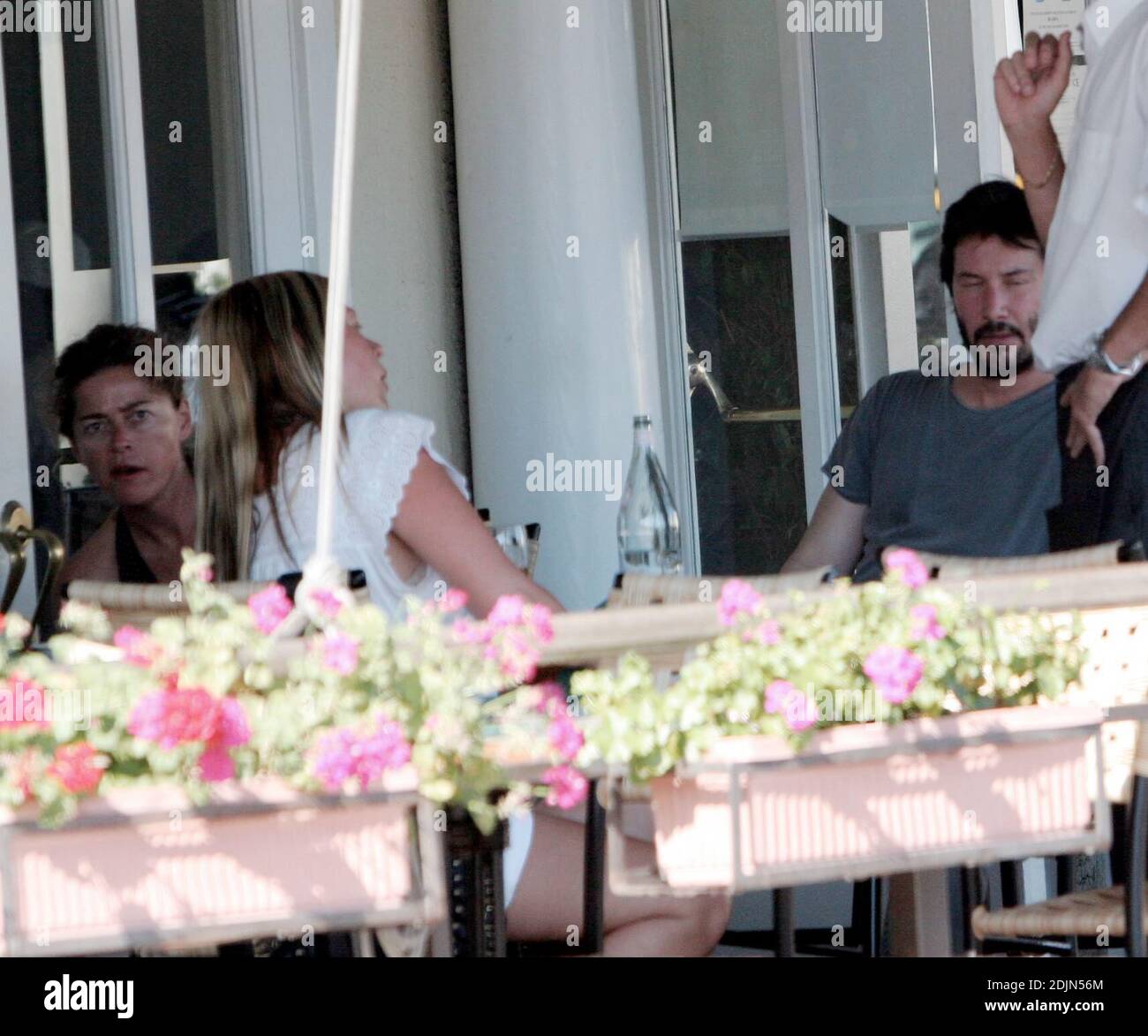 Exclusive!! Keanu Reeves and two female lunch dates dine outside at ...