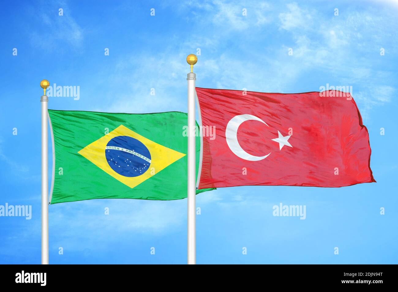 Brazil and Turkey two flags on flagpoles and blue cloudy sky Stock ...