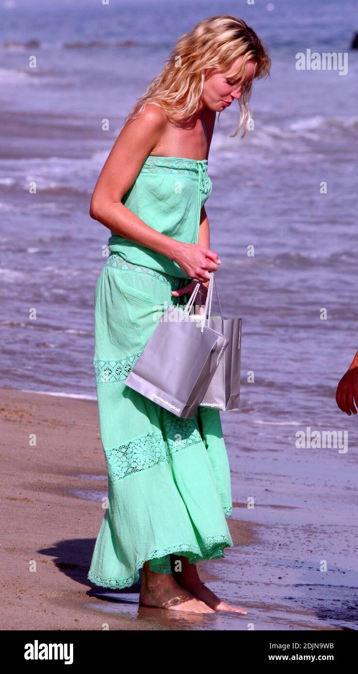 Ashley Scott at a beach party in Malibu, Ca. 7/22/06 Stock Photo - Alamy