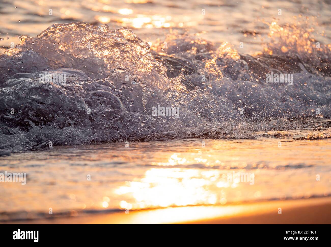 wave splash sea beach macro, close up Stock Photo - Alamy
