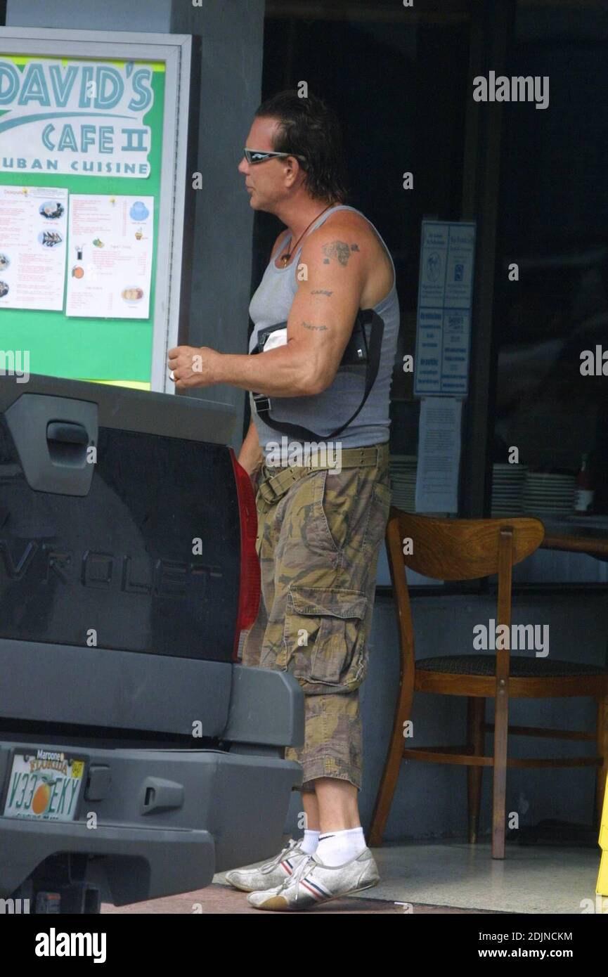 Exclusive!! Mickey Rourke braves the daylight to have a smoke and a ...