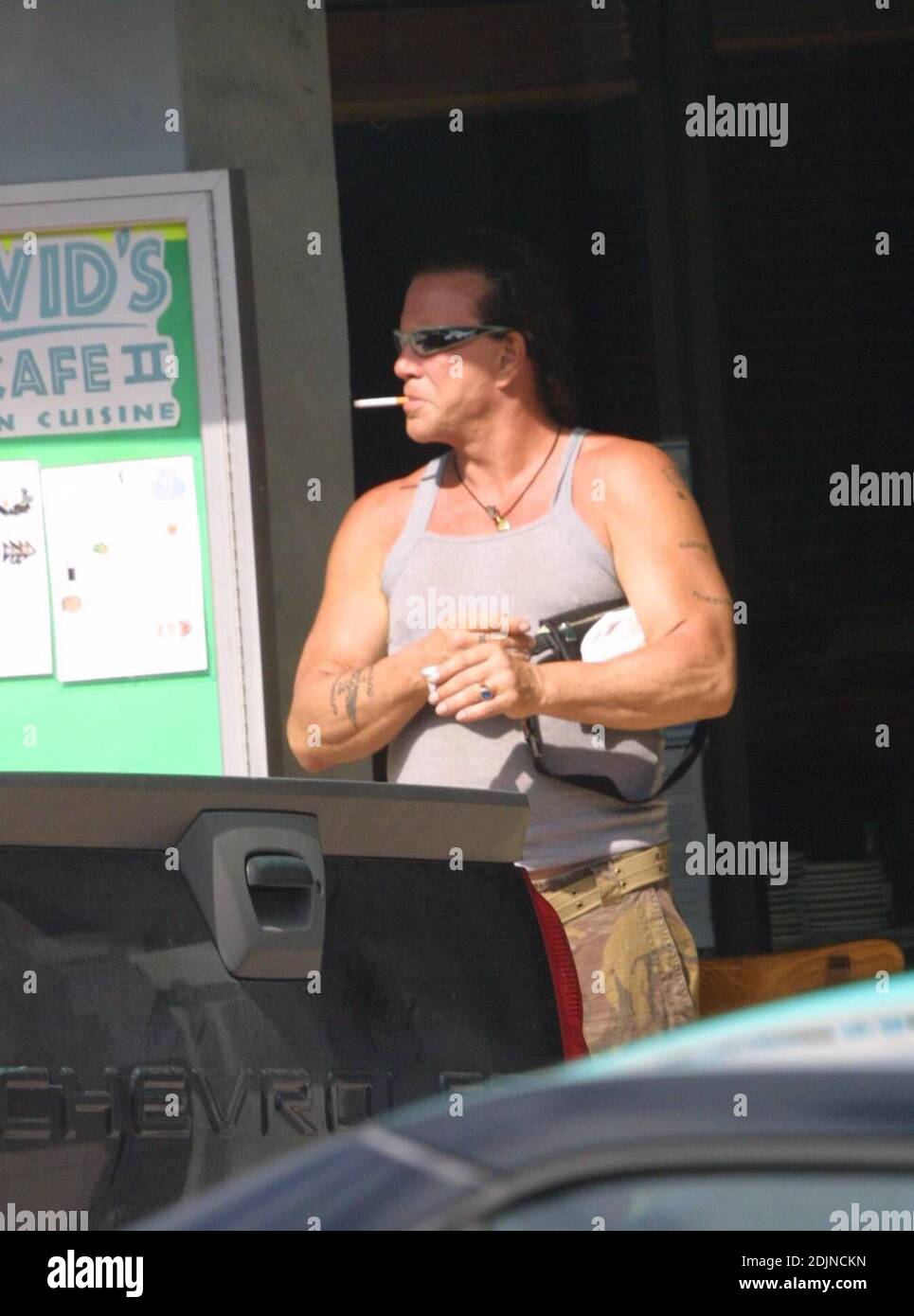 Exclusive!! Mickey Rourke braves the daylight to have a smoke and a ...