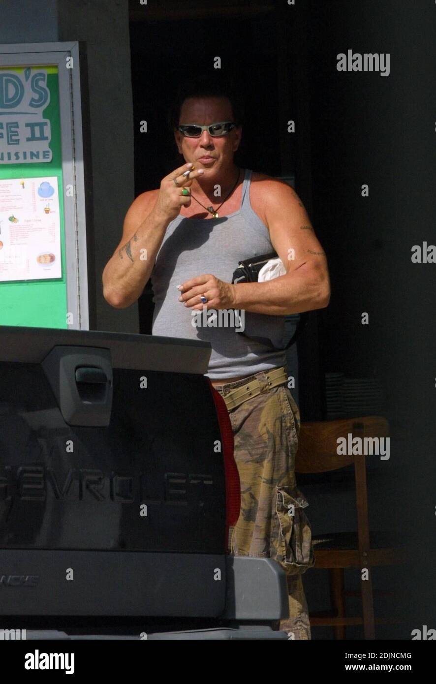 Exclusive!! Mickey Rourke braves the daylight to have a smoke and a ...