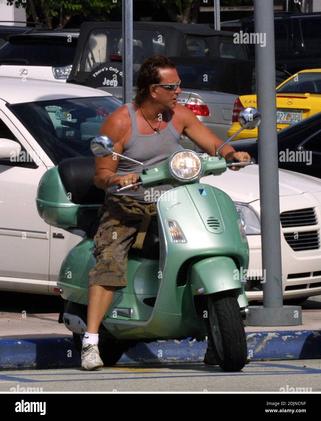 Exclusive!! Mickey Rourke braves the daylight to have a smoke and a ...