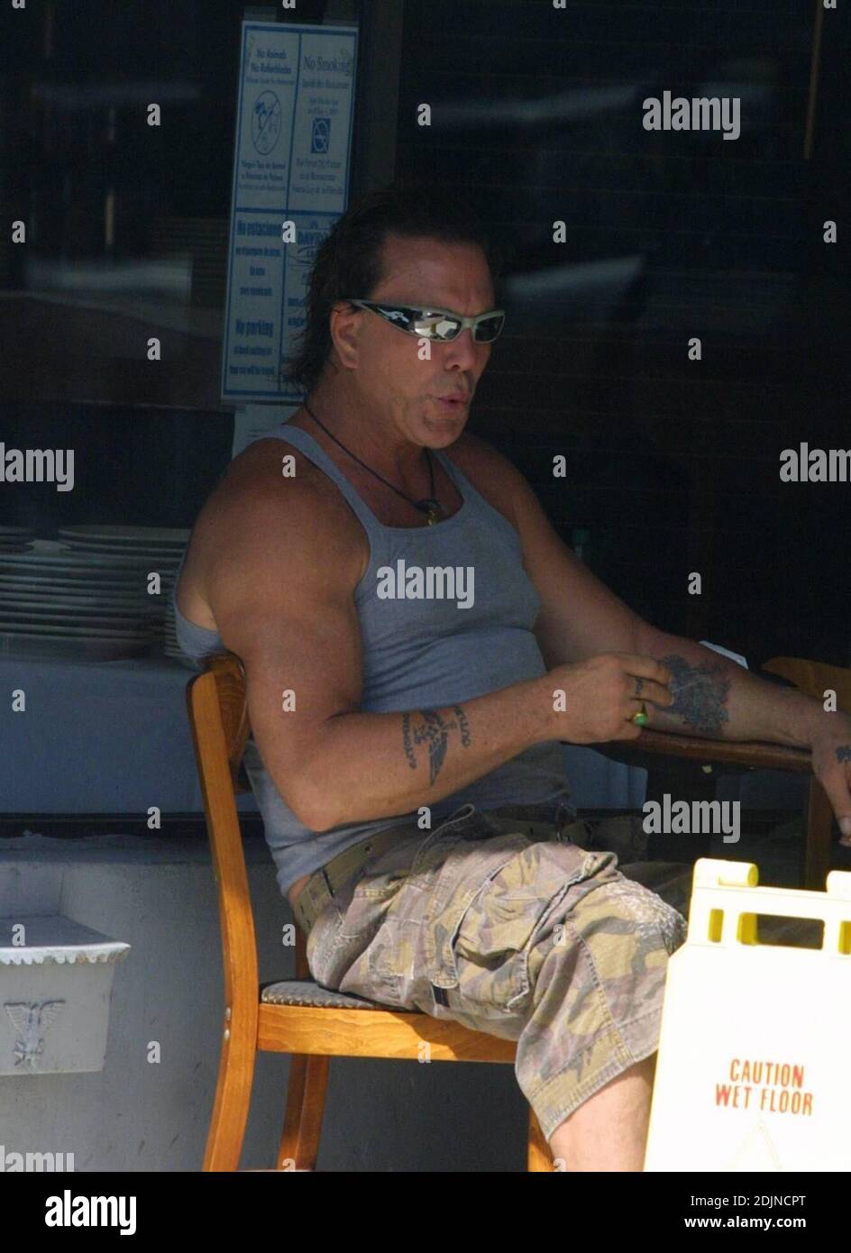 Exclusive!! Mickey Rourke braves the daylight to have a smoke and a ...