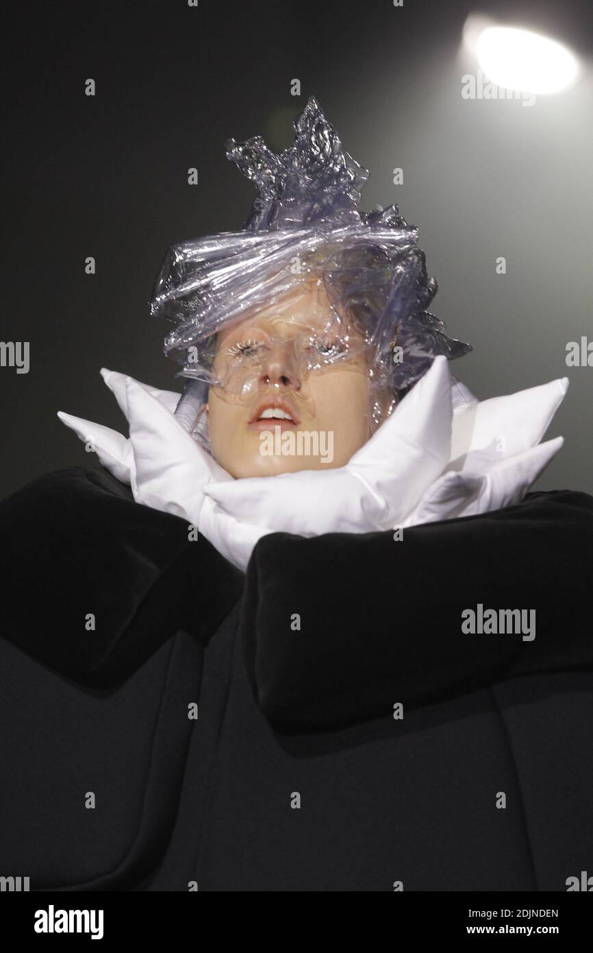 A model walks the runway at the Comme des Garcons show as a part of ...