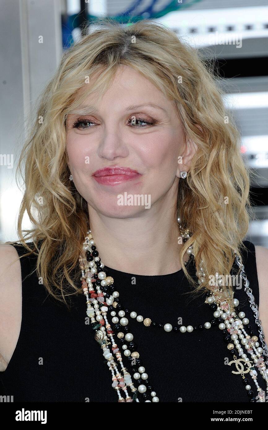 Courtney Love attending the Chanel show as a part of Paris Fashion Week ...