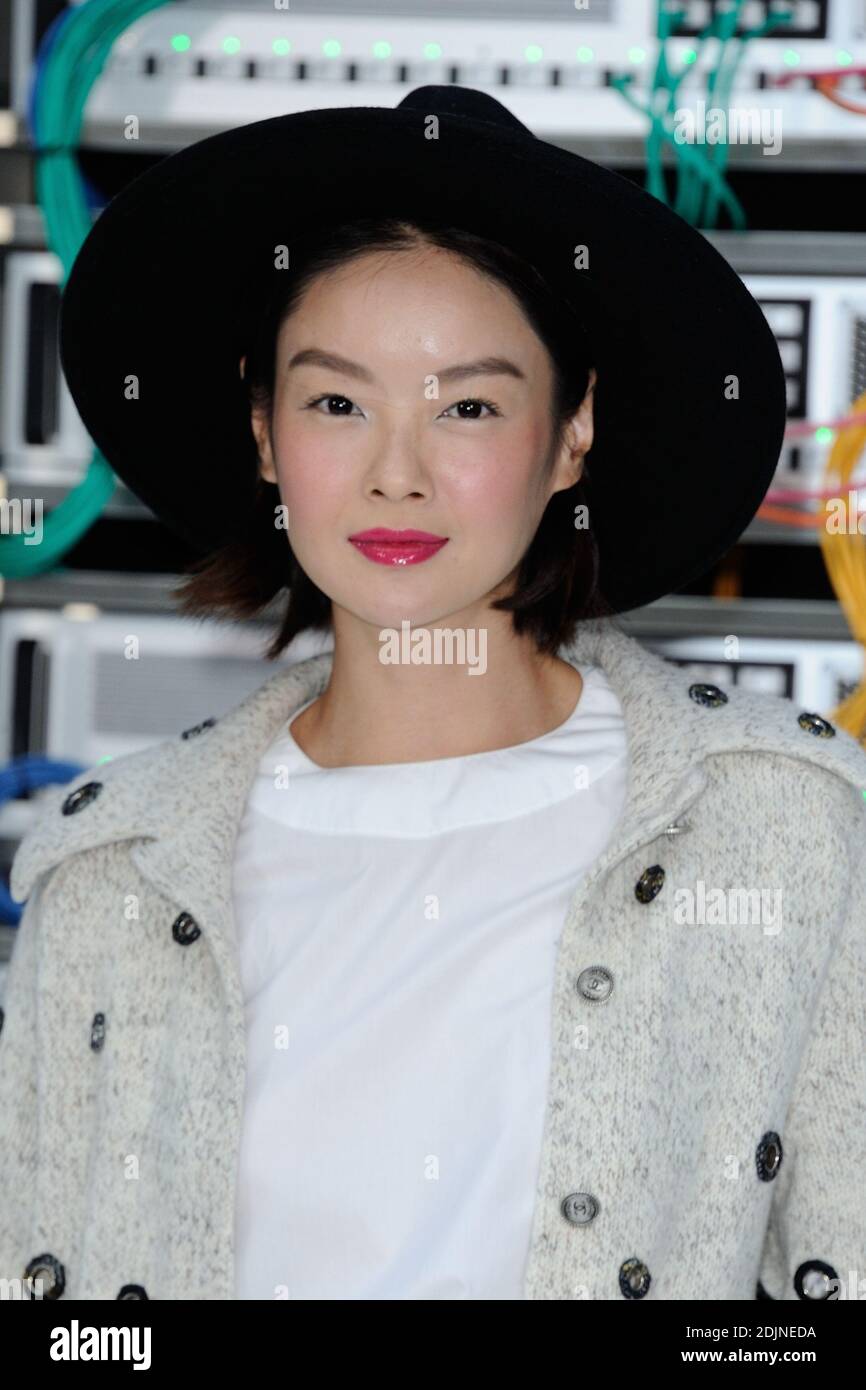 Sheila Sim attending the Chanel show as a part of Paris Fashion Week ...