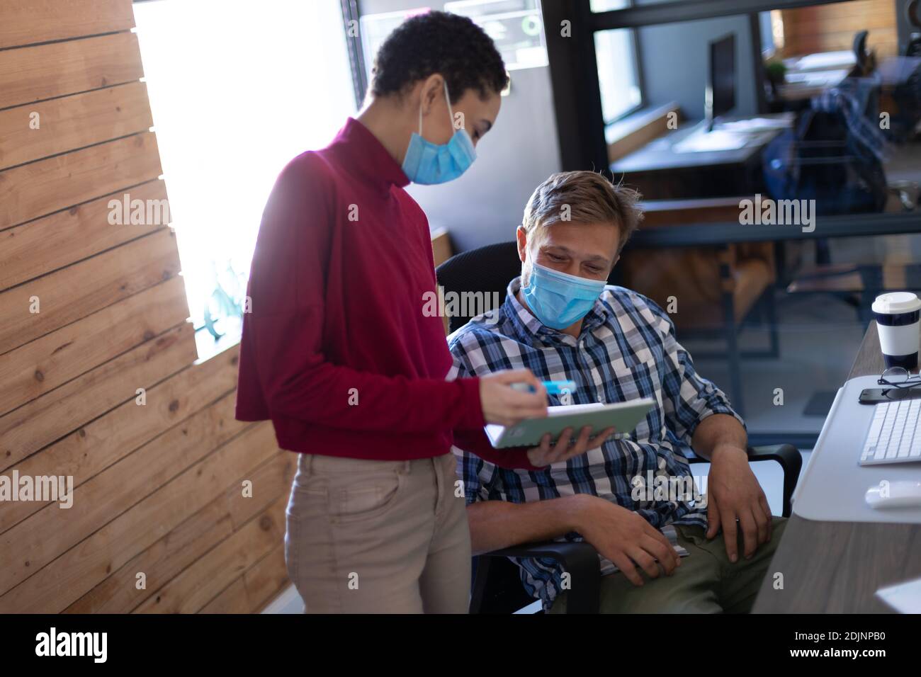 Diverse male female colleagues wearing hi-res stock photography and ...