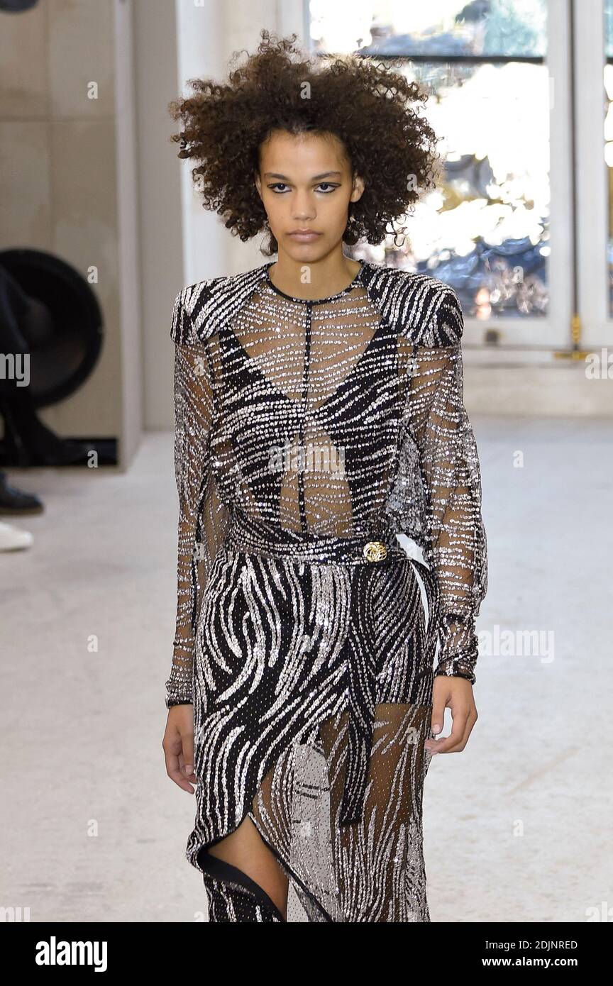 A model walks the runway at the Louis Vuitton show as part of Paris ...