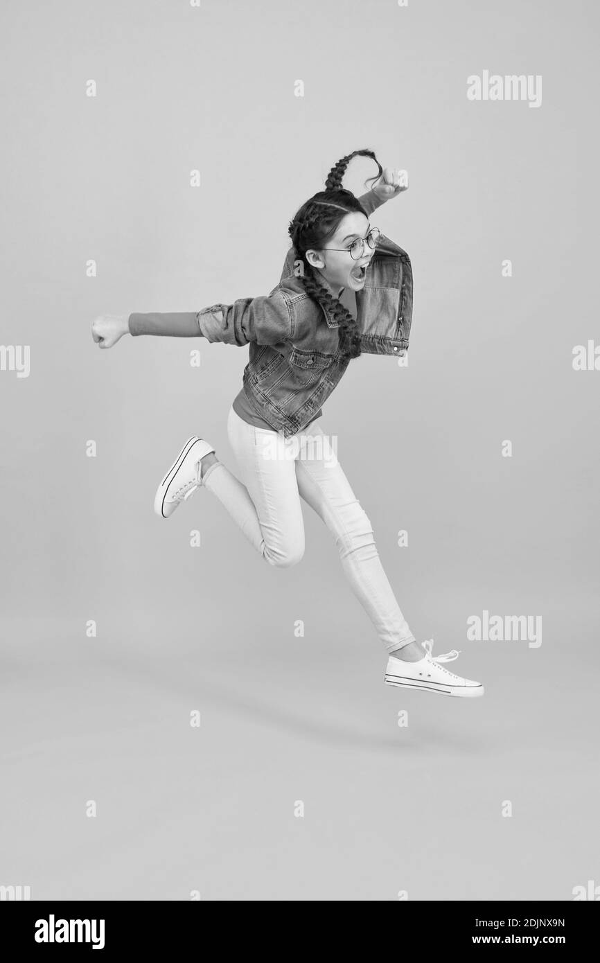 Little girl playing running on Black and White Stock Photos & Images ...