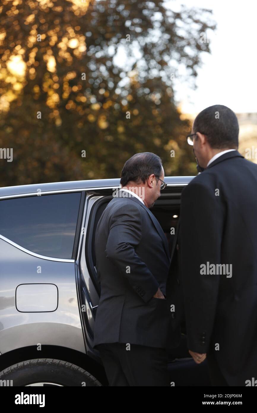 French President Francois Hollande leaves after attending a colloquium ...