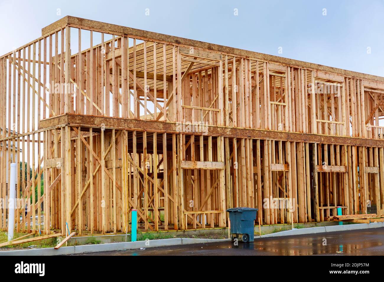 Framing of under construction wooden house building frame structure on ...