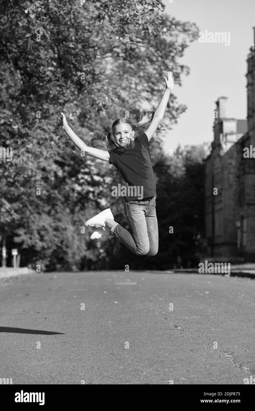 Do more of what makes you happy. Happy child jump high outdoors. Happy ...