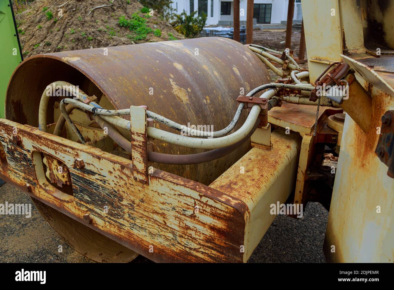 The bulldozer moves soil digging ground doing landscaping works on ...