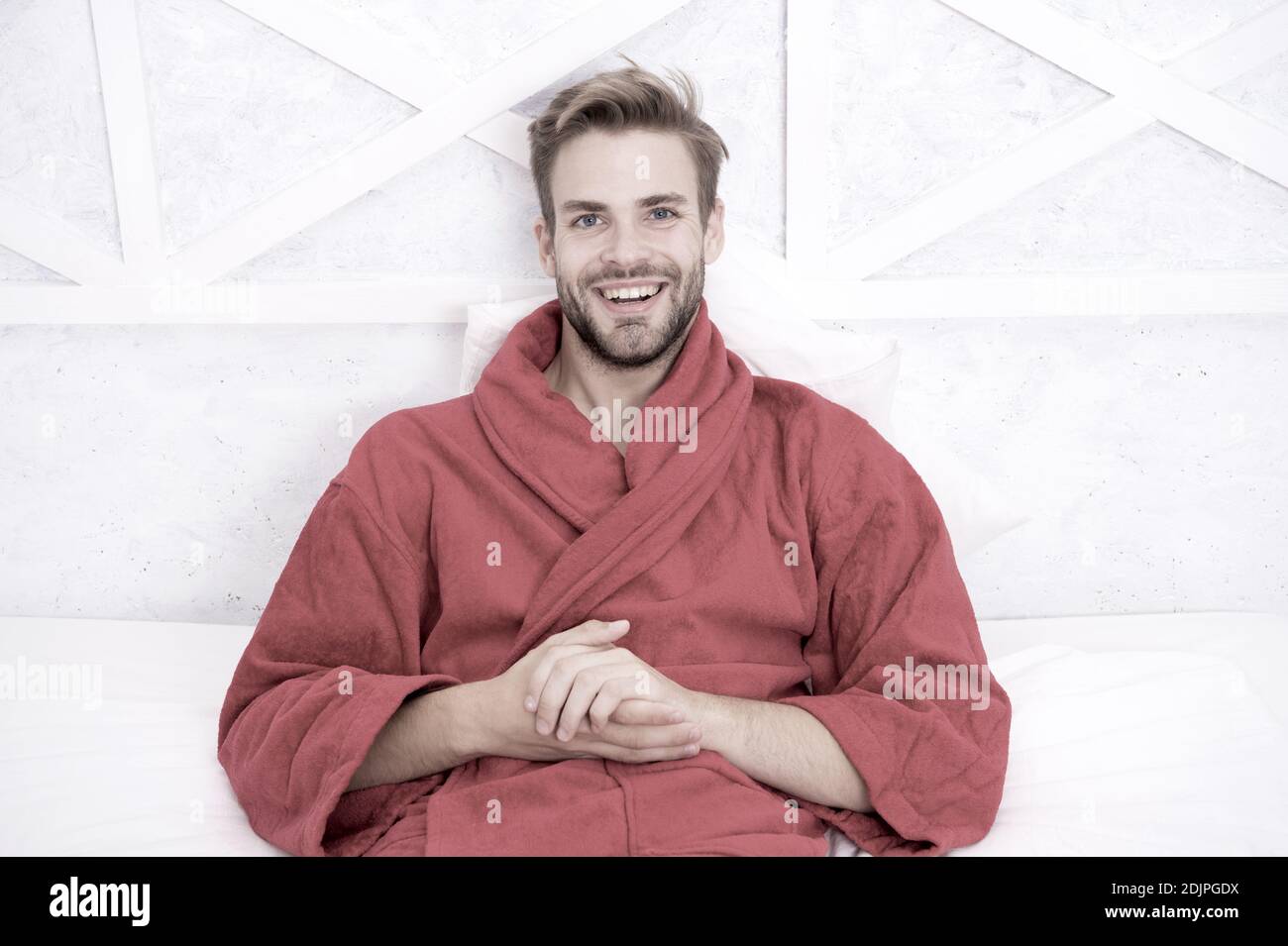 Guy in bathrobe relaxing. Relaxing before fall asleep. Get enough ...