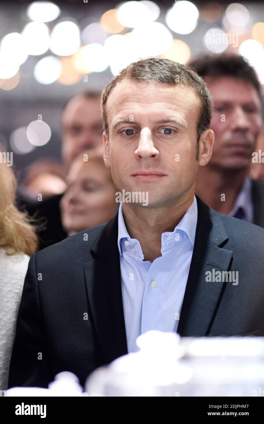 Emmanuel Macron visits the Paris Motor show on October 14, 2016 at ...